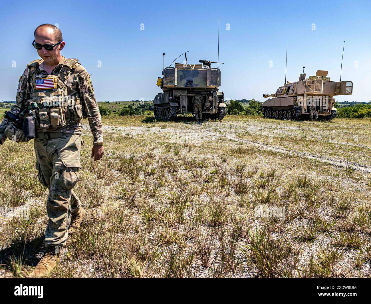 Members from the Kentucky National Guard Field Artillery unit complete ...