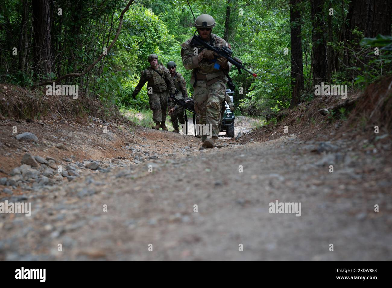 U.S. Air Force Airmen assigned to the 42nd Air Base Wing carry a ...