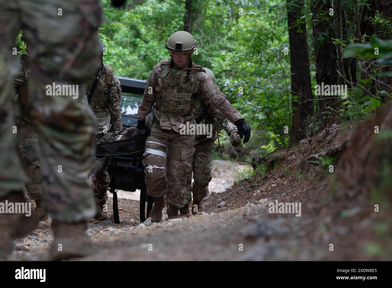 U.S. Air Force Airmen assigned to the 42nd Air Base Wing carry a ...