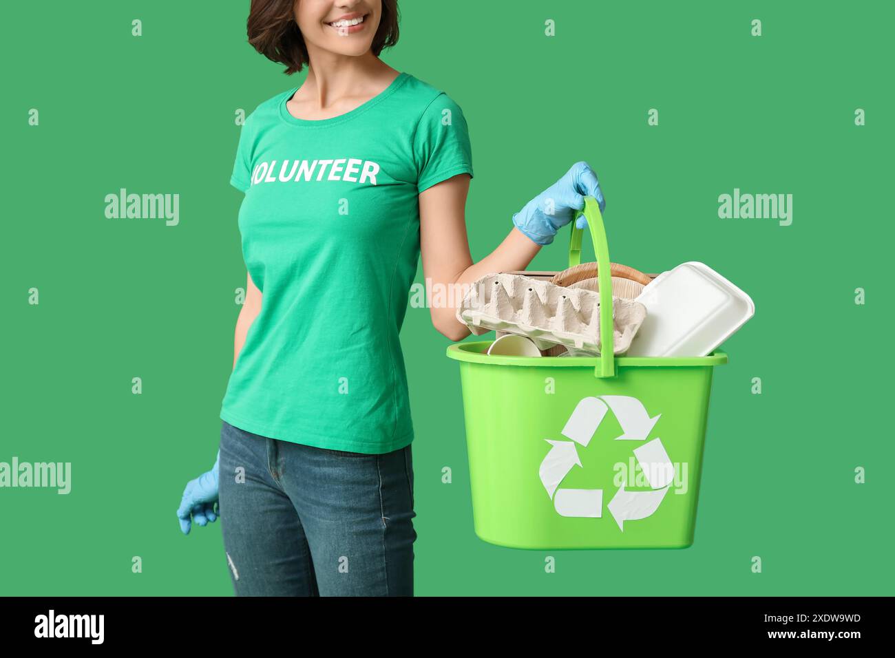 Female activist holding recycling hi-res stock photography and images ...