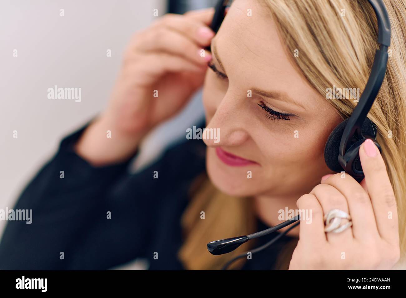 Friendly Call Center Agent Answering Incoming Calls with Headset ...