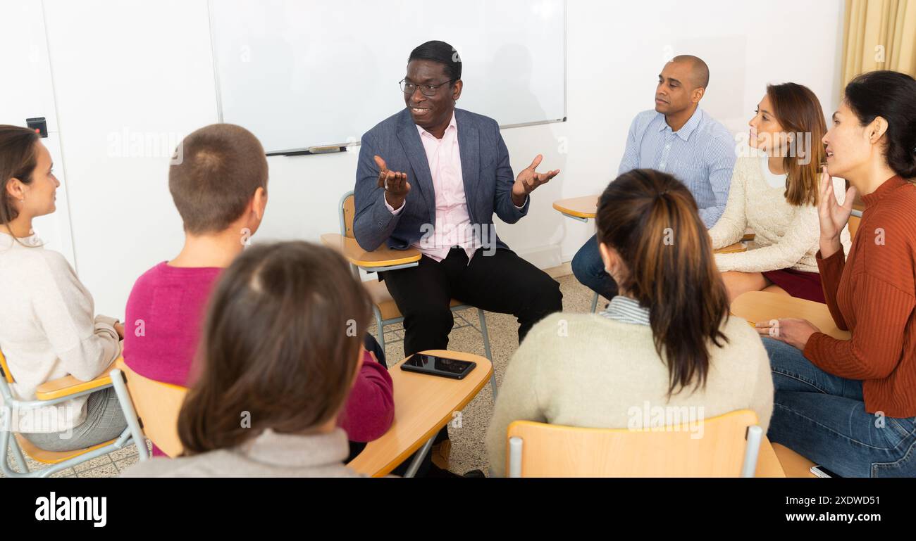 University teacher conducts lesson for students Stock Photo - Alamy