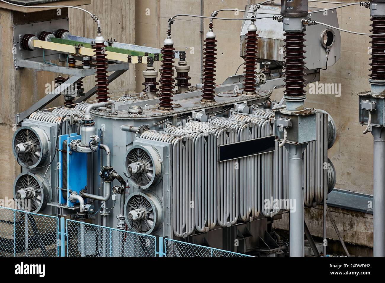 High voltage electricity transformer at a power station Stock Photo - Alamy