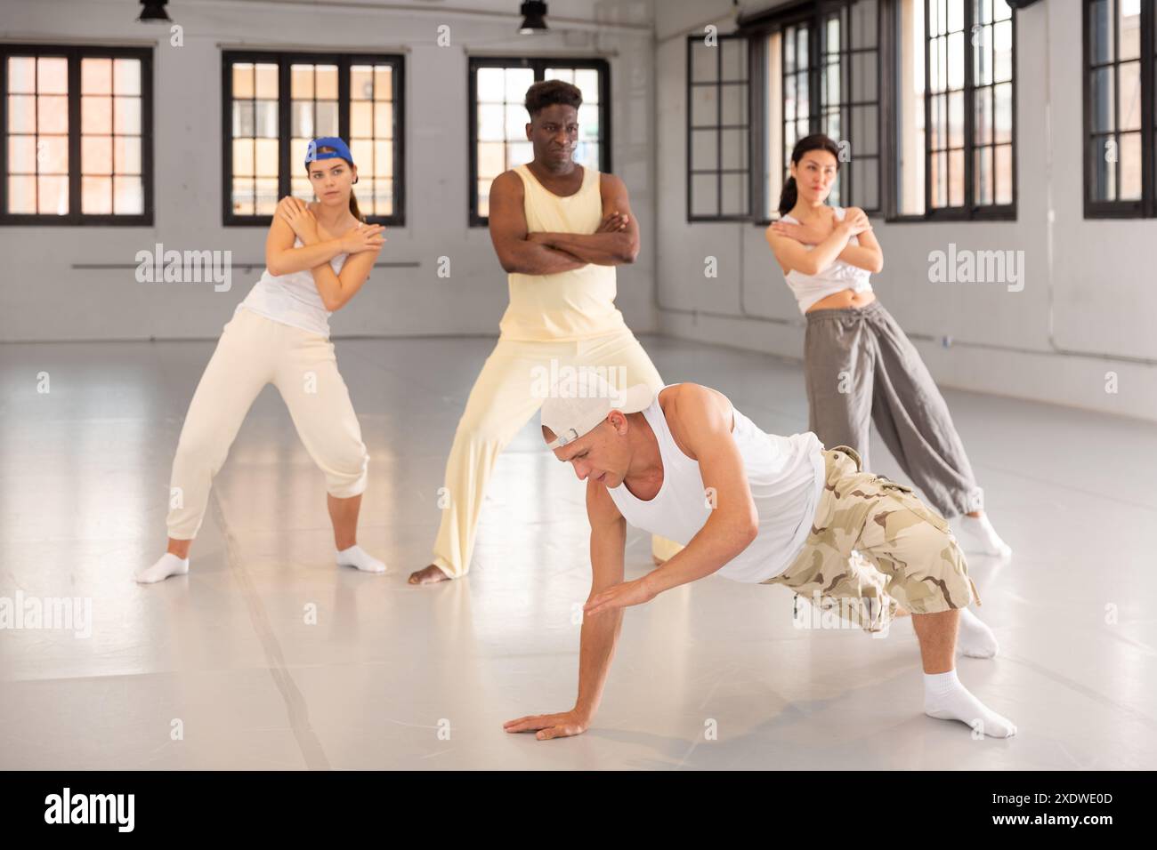 Team of dancers performing hip-hop dance Stock Photo - Alamy