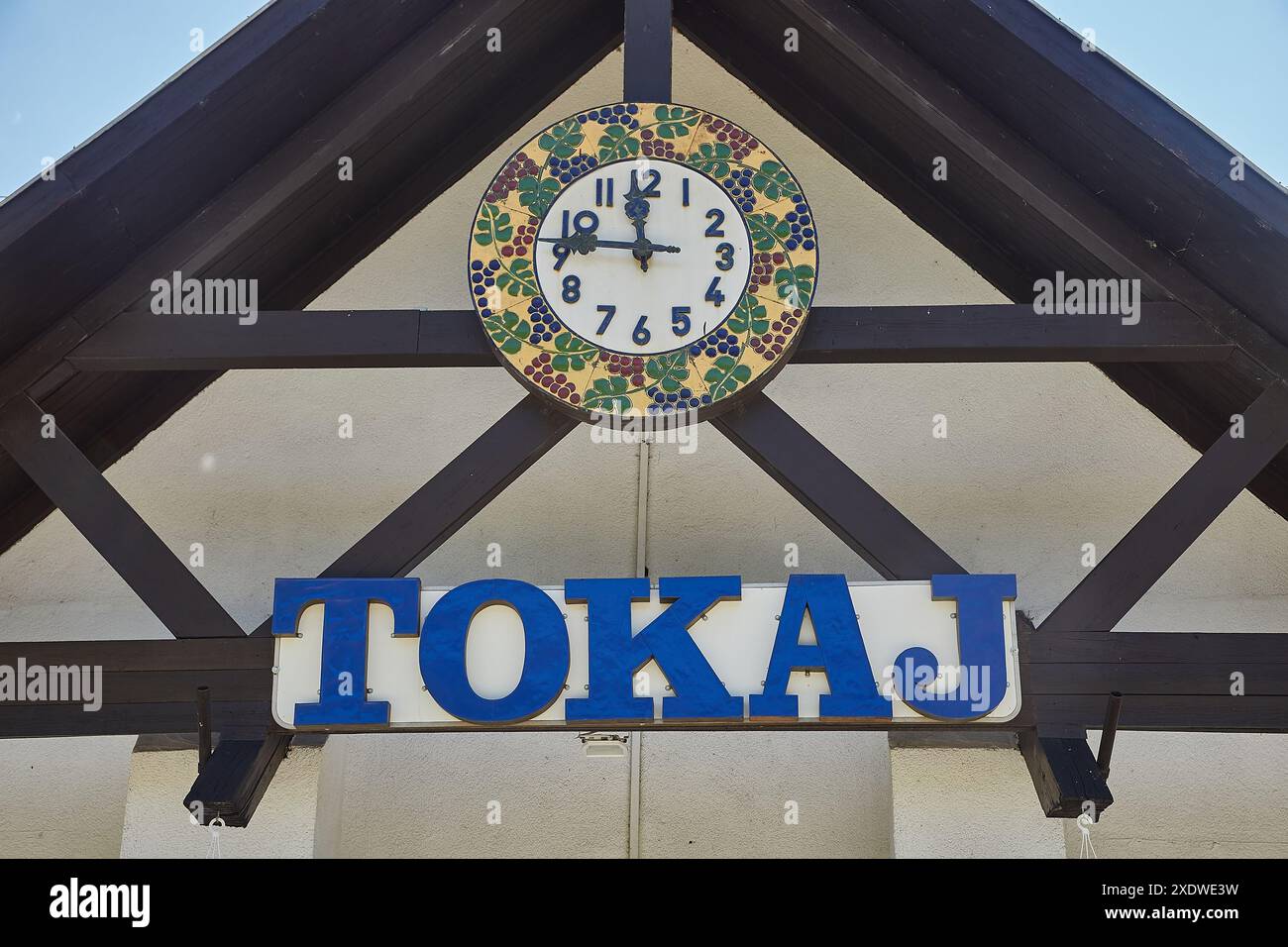 Tokaj railway station sign on the building facade Stock Photo - Alamy