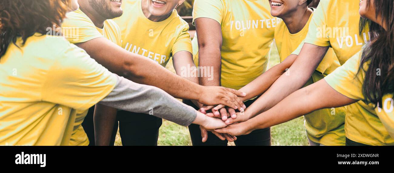 Volunteer, Team people stacking hands celebrating together. Charity and ...