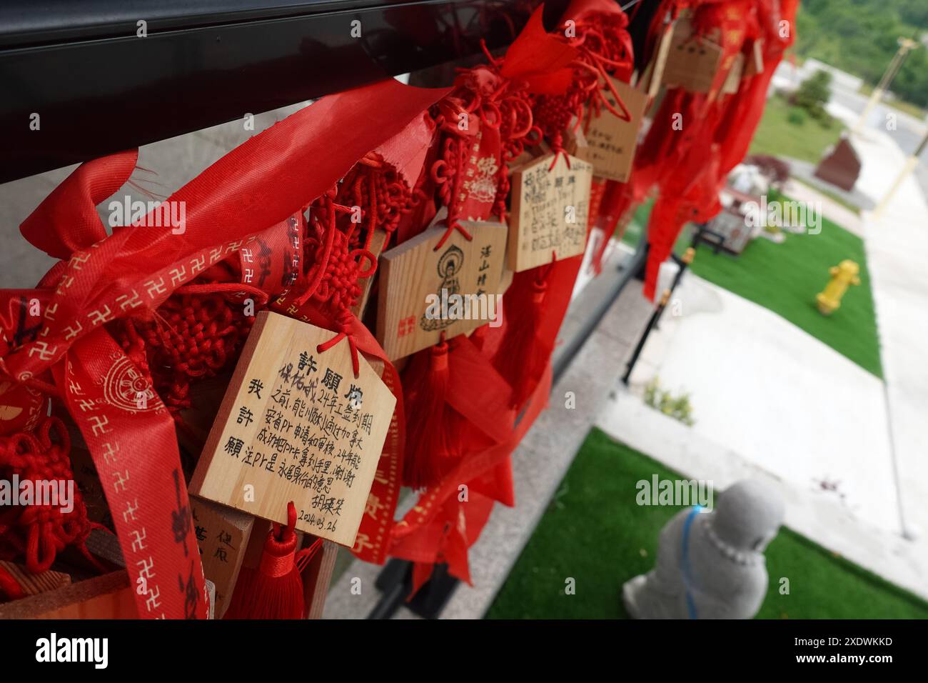 Explore a close-up view of Ema, small wooden plaques inscribed with ...