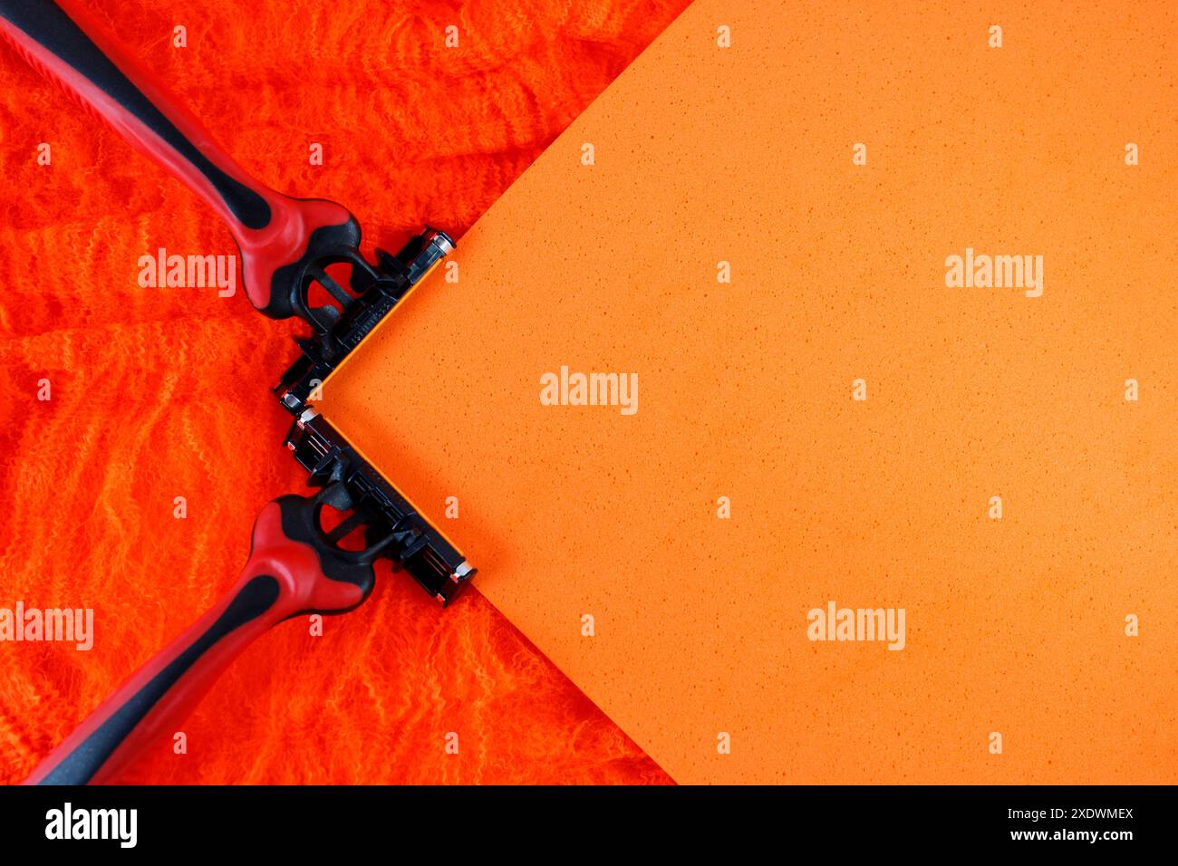 Square area cleared by two razor blades on textured background Stock ...