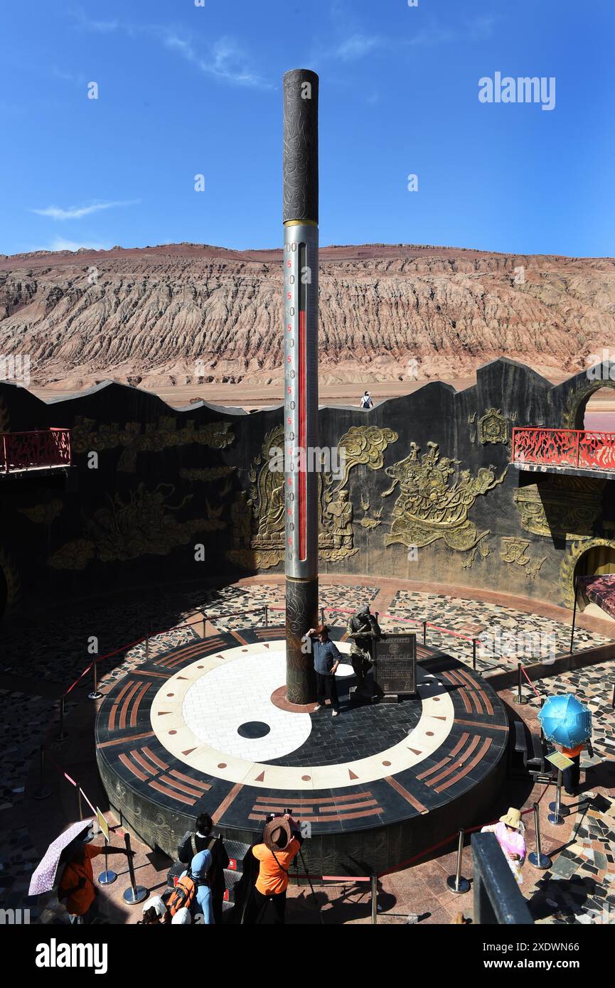 TURPAN, CHINA - JUNE 24, 2024 - Tourists visit the Flaming Mountain ...
