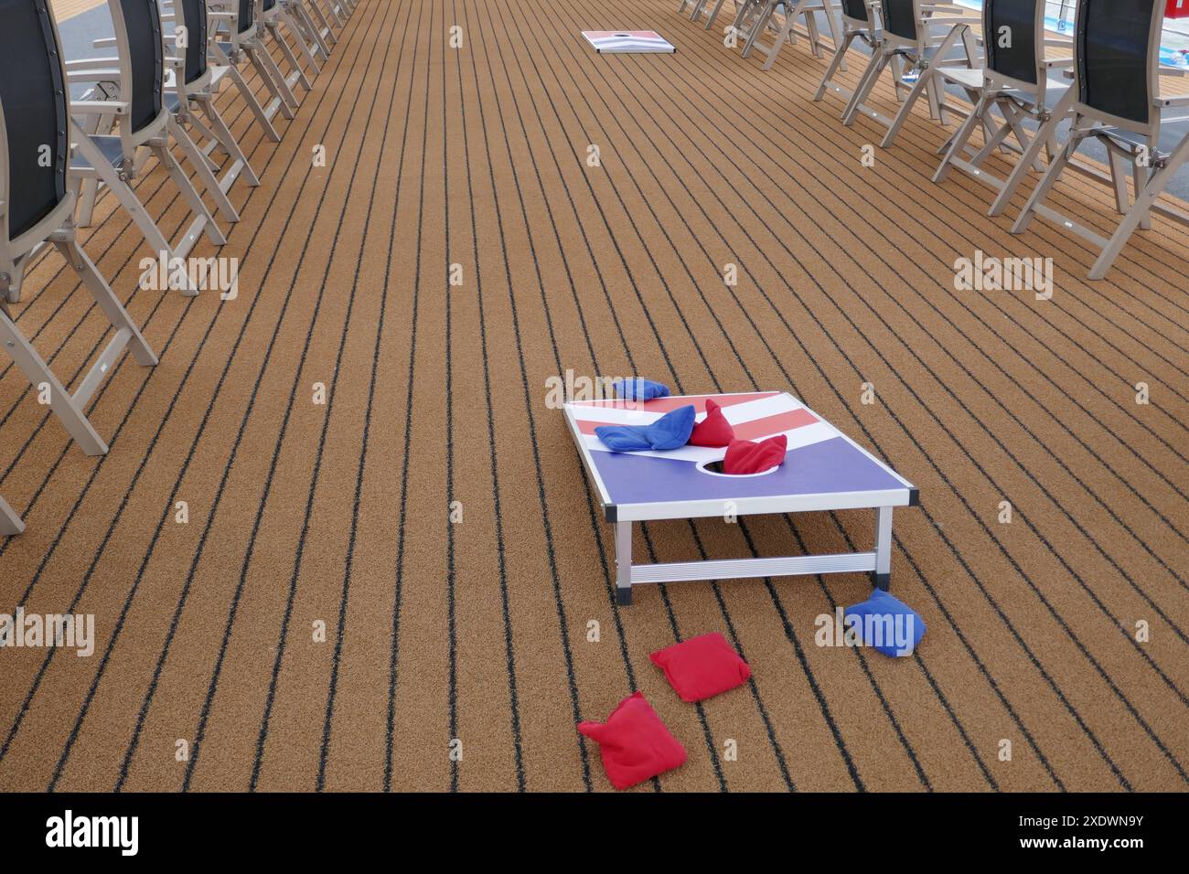 Red, white and blue corn hole game with bags Stock Photo - Alamy