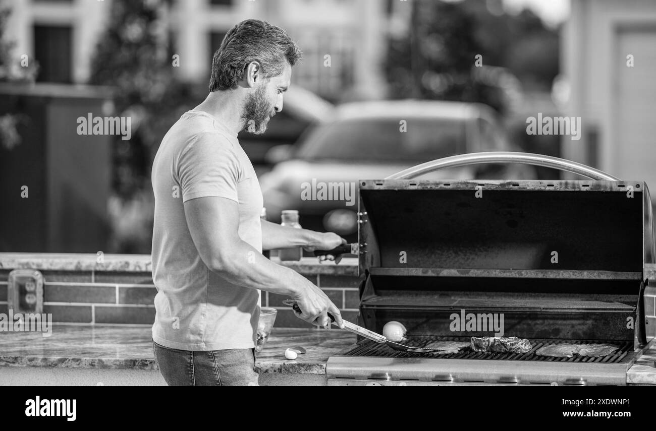 Preparing ribeye steak cooking Black and White Stock Photos & Images ...