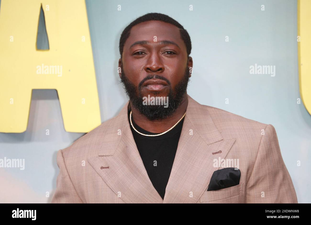 Eric Kofi Abrefa attends the UK Premiere of "Supacell" at Odeon Luxe West End in London Stock ...