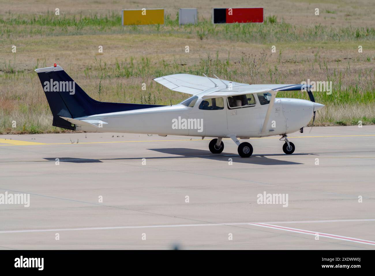 A small training aircraft prepares for take-off at the runway Stock ...