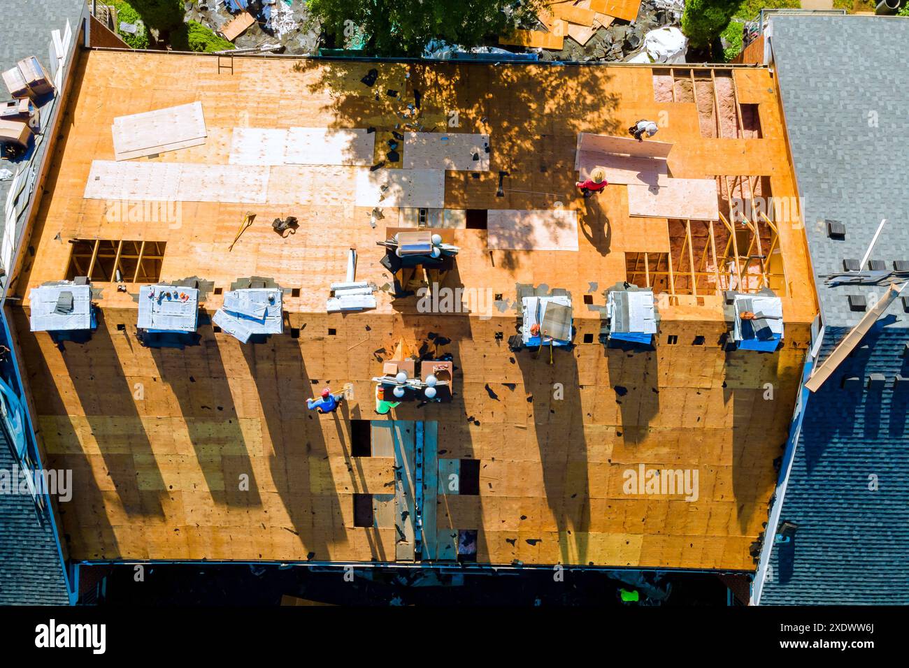 Repair of roofing replacing old asphalt bitumen shingles on house roof ...