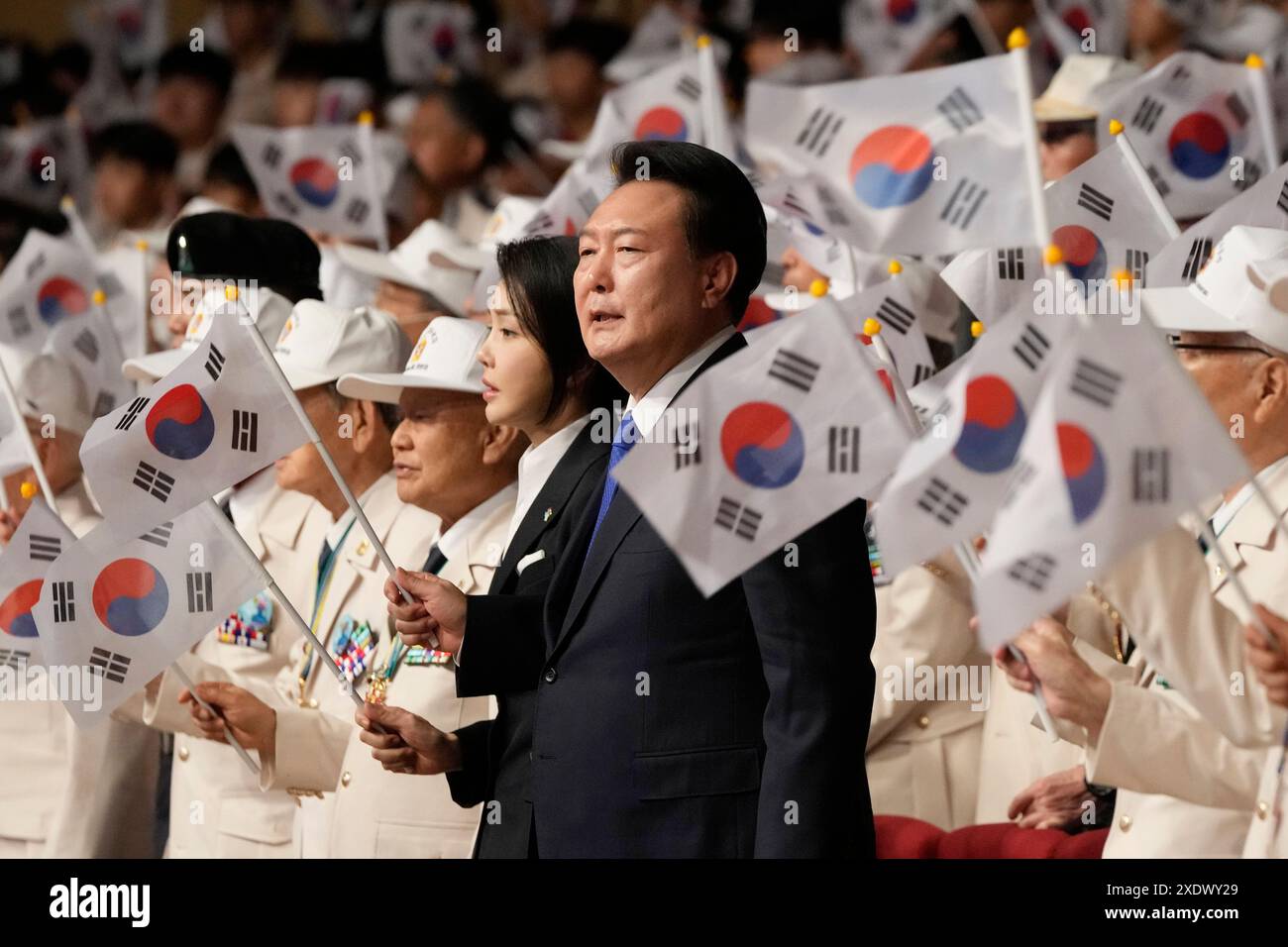 South Korean President Yoon Suk Yeol, center right, his wife Kim Keon ...