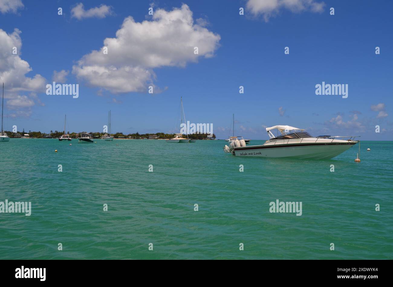 Beach with speed boats Stock Photo - Alamy
