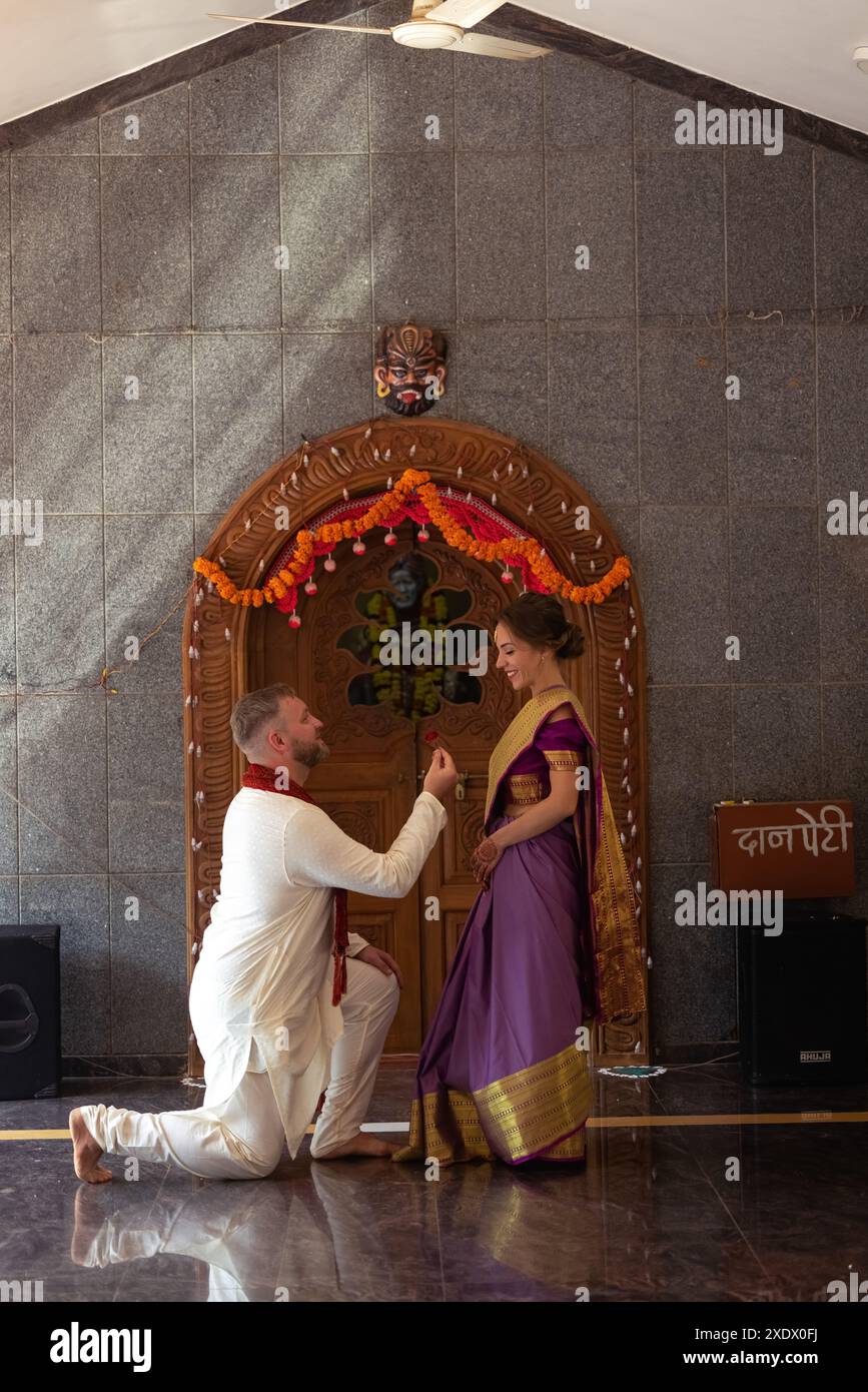 Wedding of a couple from Europe in India. A light skinned man in a ...