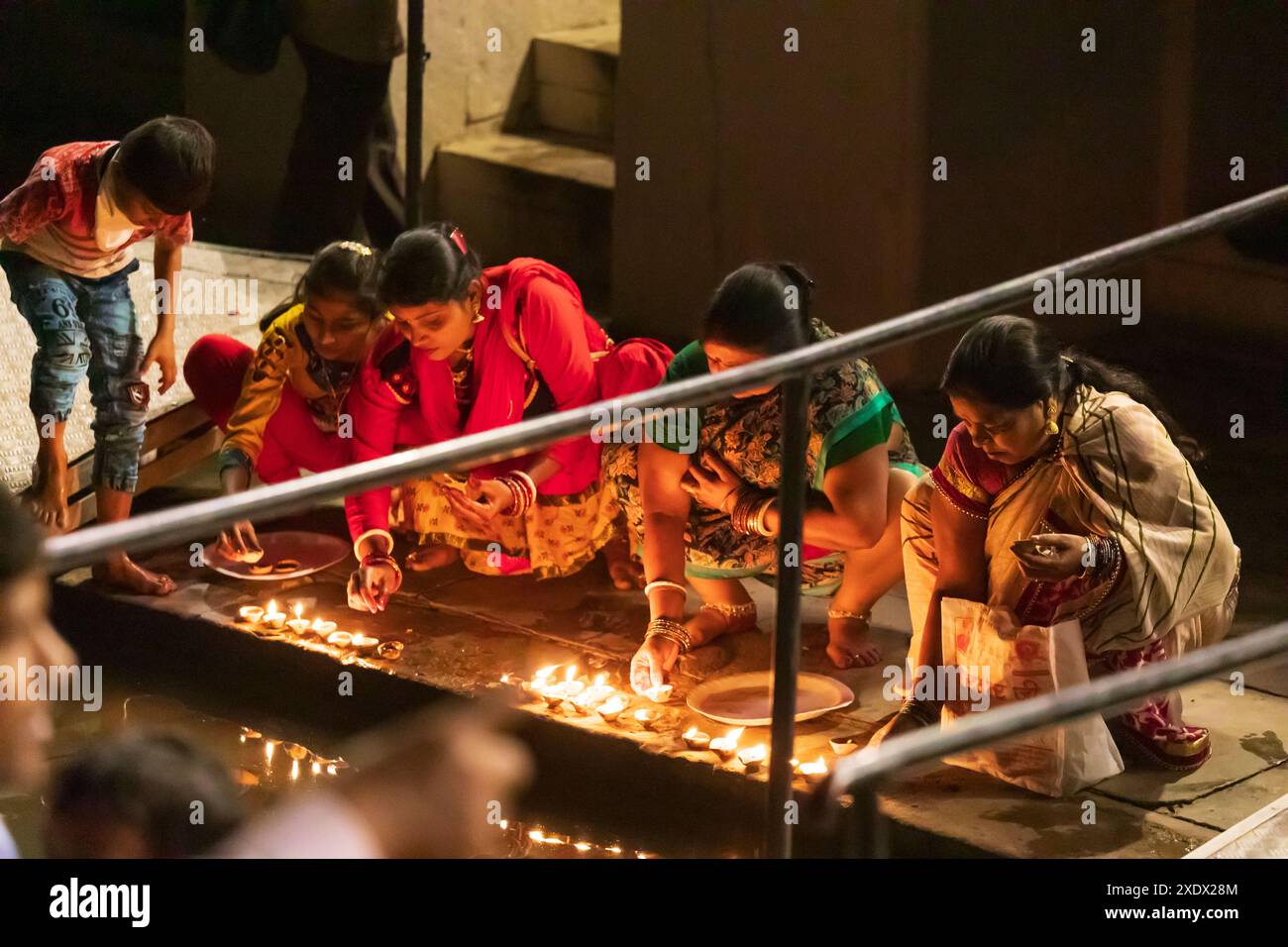 Indian woman praying fire hi-res stock photography and images - Alamy