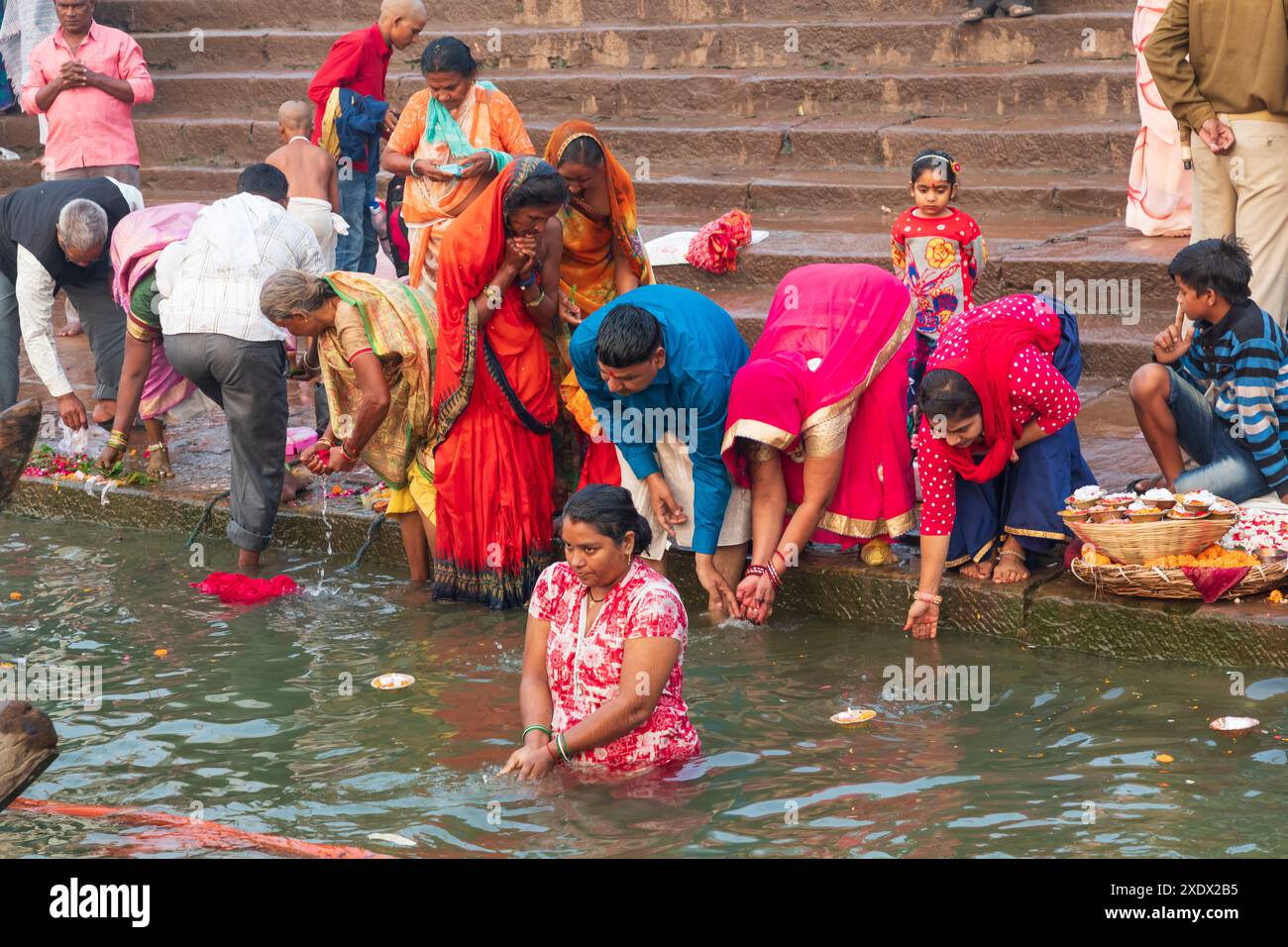 India, Uttar Pradesh, Varanasi. People bathing in the Ganges Stock ...