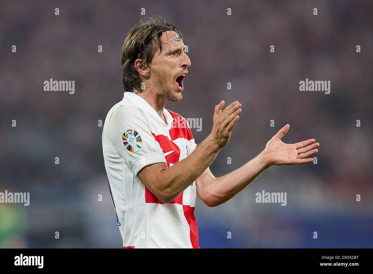 Leipzig, Germany. 24th June, 2024. Luka Modric of Croatia gestures ...