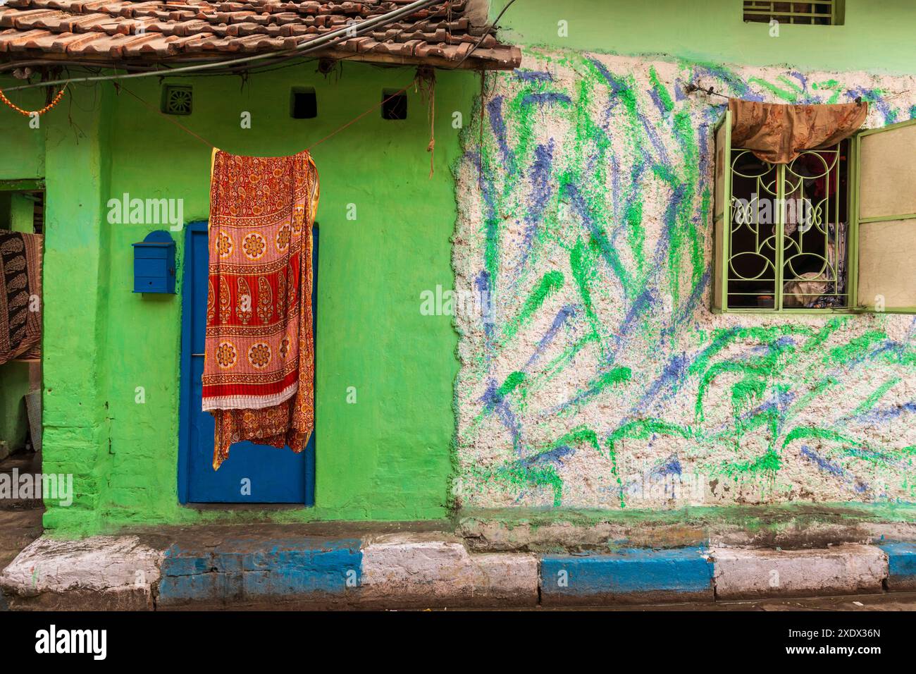 India, West Bengal, Kolkata, Taltala. Green, white, and blue wall Stock ...