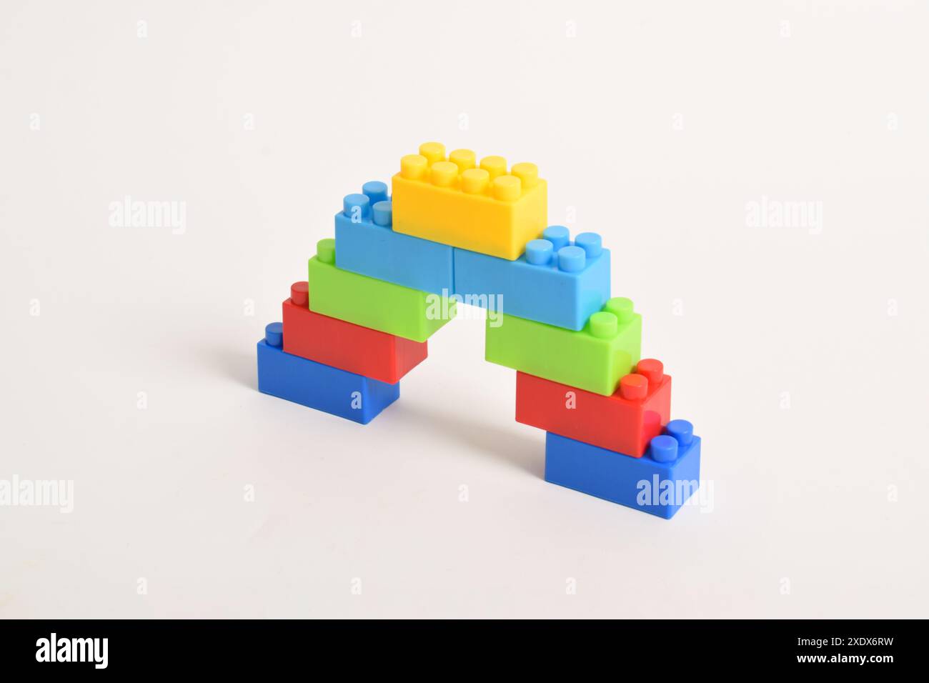 A rainbow color lego stairs isolated on white background. Building ...