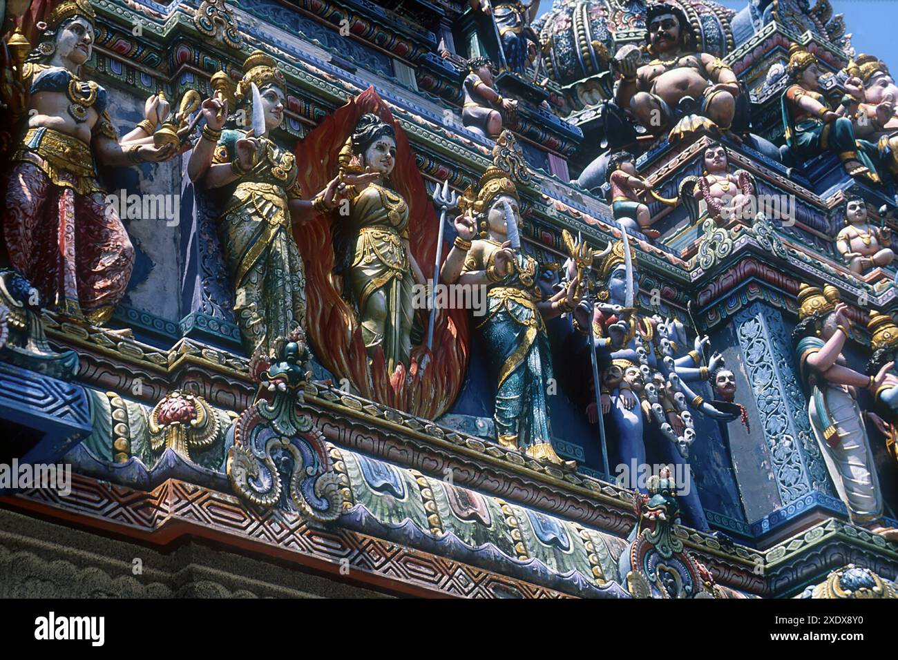 Gopuram tower with gaudy deities, taken in 1994, Sri Veeramakaliamman ...