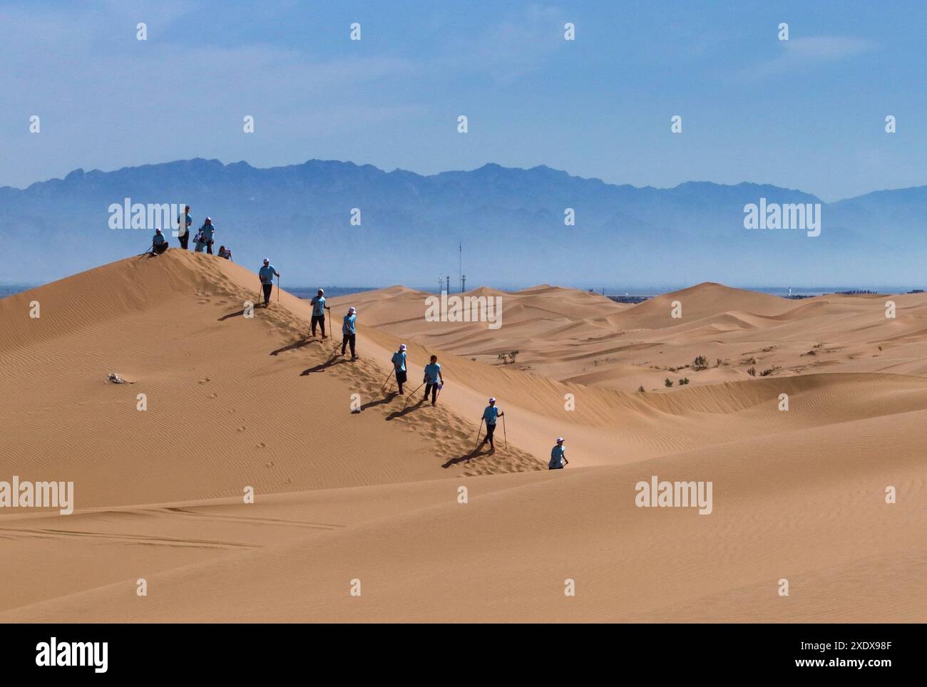 ORDOS, CHINA - JUNE 25, 2024 - Sports enthusiasts compete in the Desert ...