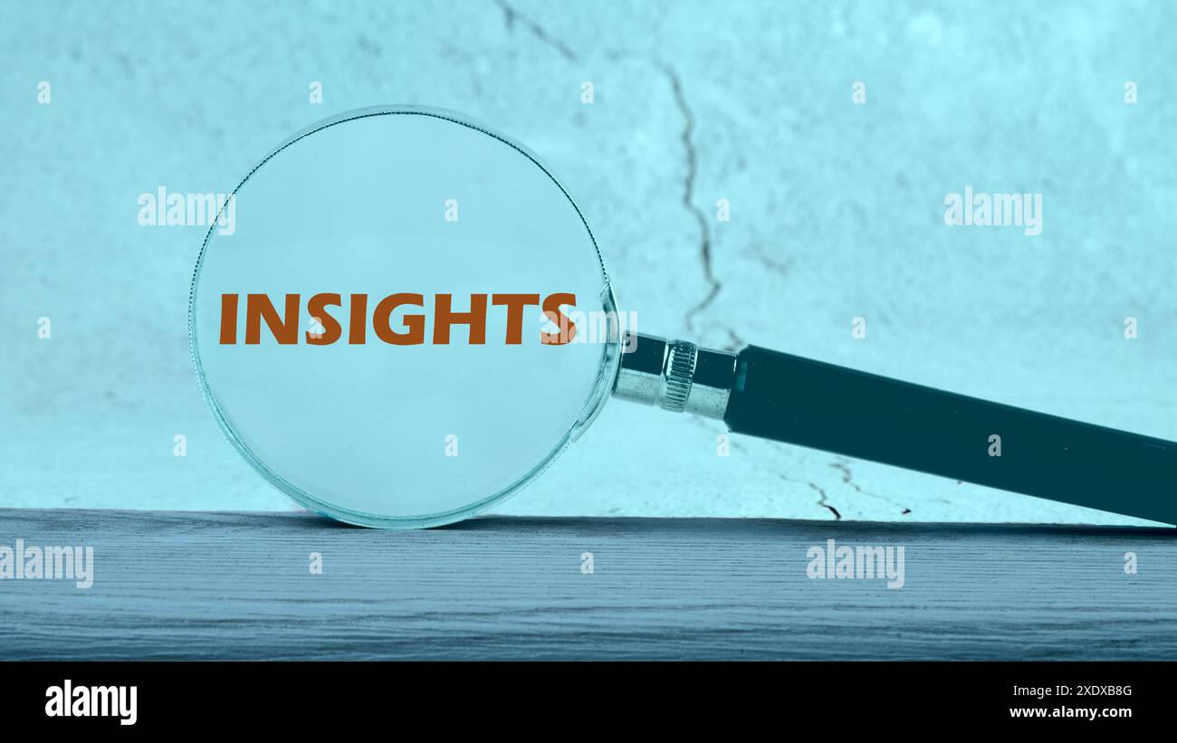 INSIGHTS, business concept. Copy space for INSIGHTS text through a ...