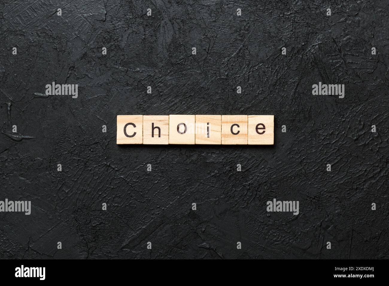 CHOICE word written on wood block. CHOICE text on cement table for your ...