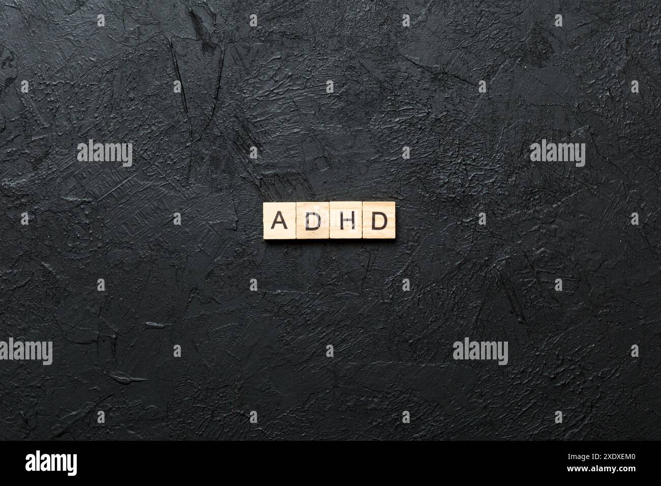 ADHD word written on wood block. ADHD text on table, concept Stock ...