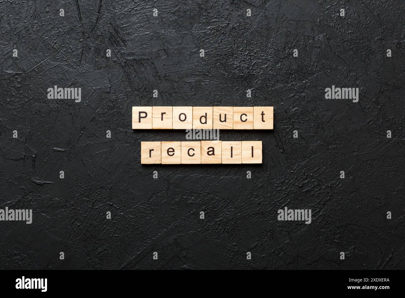 product recall word written on wood block. product recall text on table ...