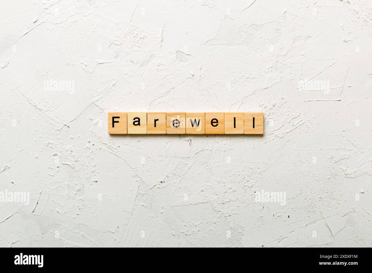 farewell word written on wood block. farewell text on table, concept ...
