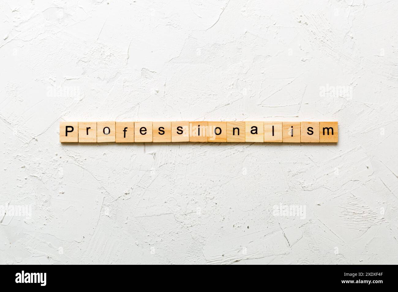 Professionalism word written on wood block. Professionalism text on ...
