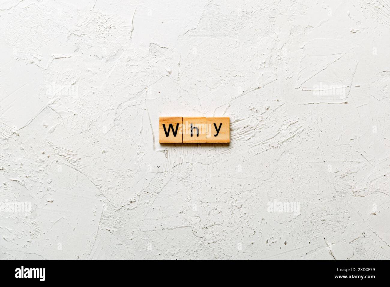 WHY word written on wood block. WHY text on cement table for your ...