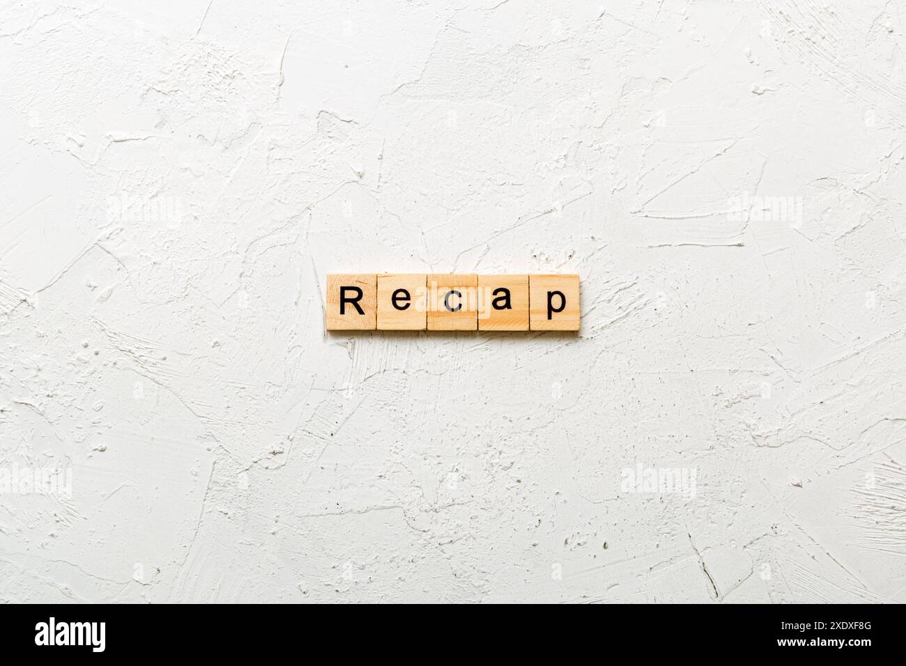recap word written on wood block. recap text on table, concept Stock ...