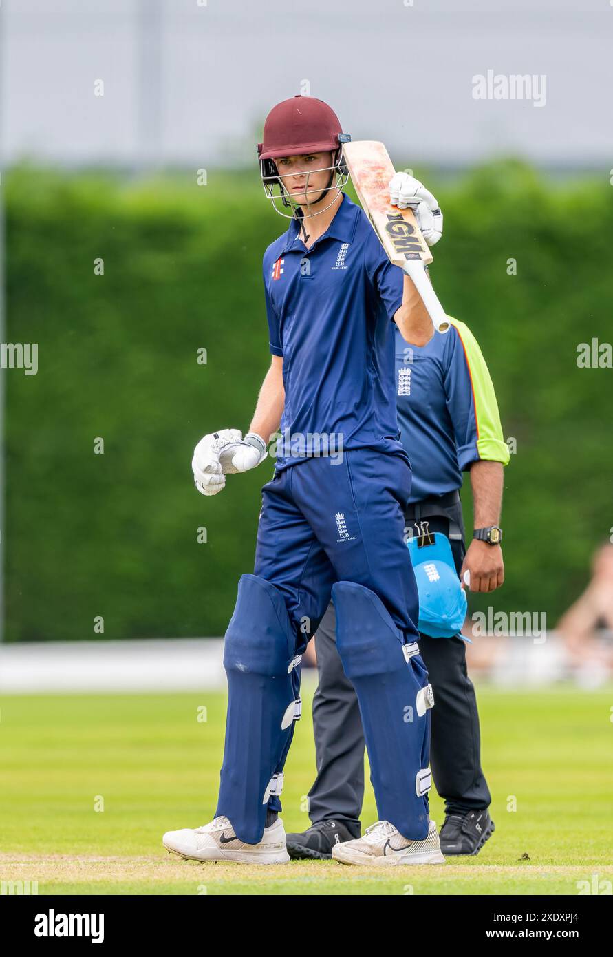 Archie Vaughan raises his bat after reaching 50 for the Young Lions ...
