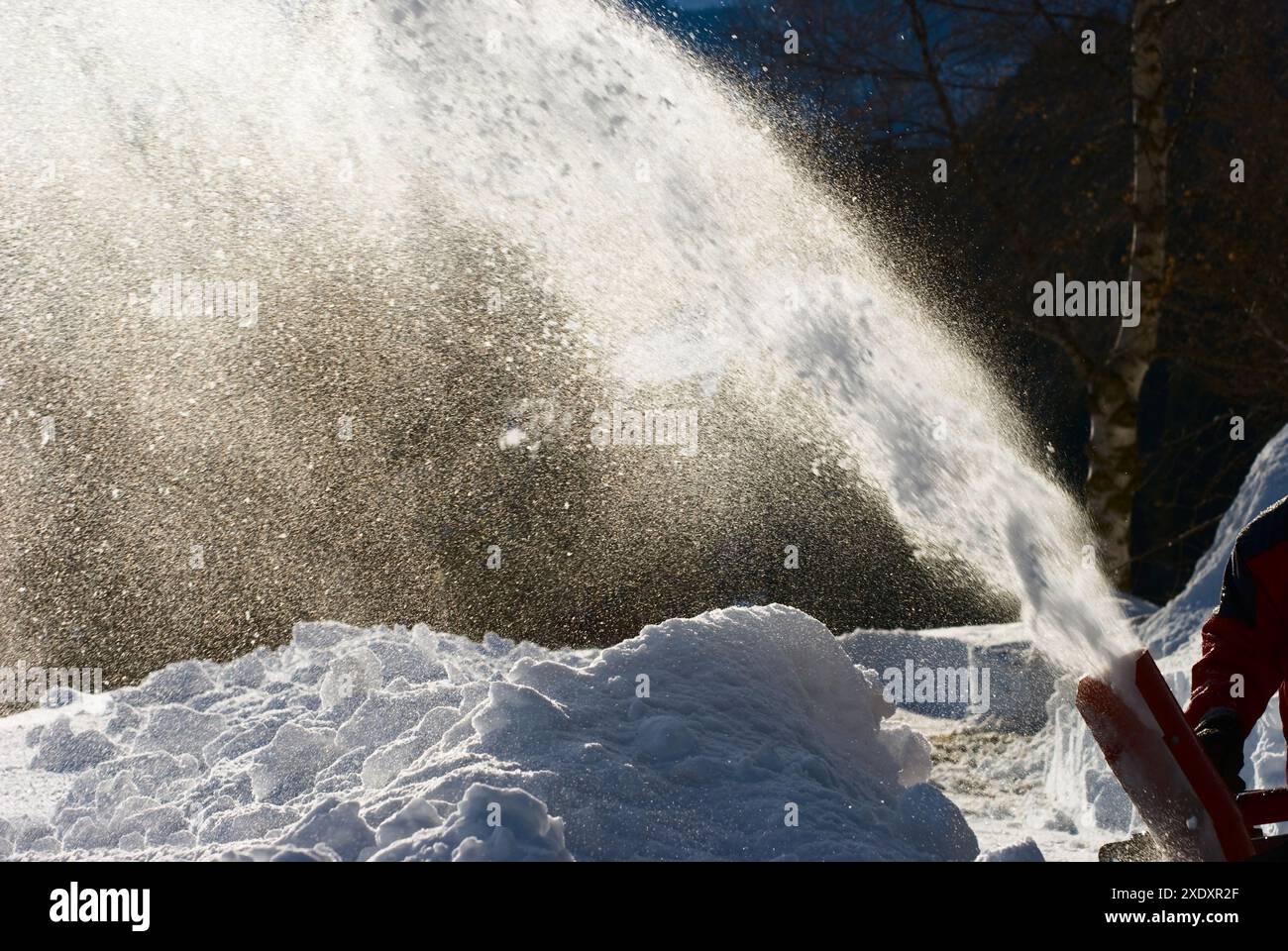 Snow flurries |Snowblower in action| Stock Photo - Alamy