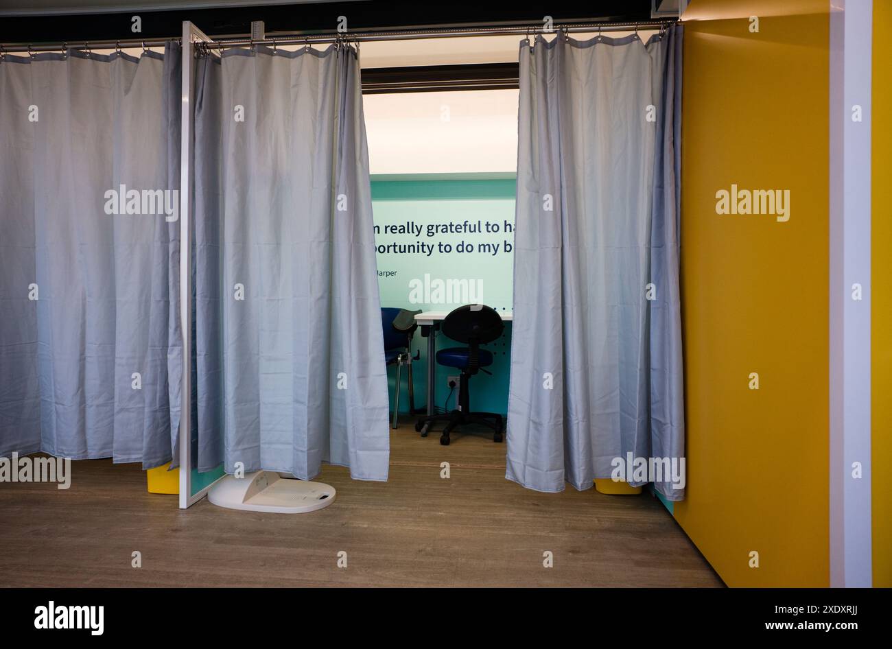 NHS Our Future Health screening bay with curtain half closed Stock ...