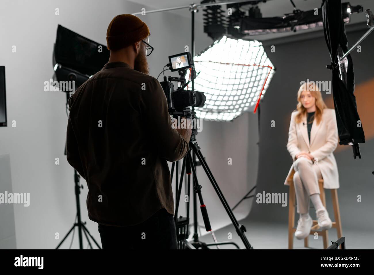 A woman at film studio set. Behind the scenes concept Stock Photo - Alamy
