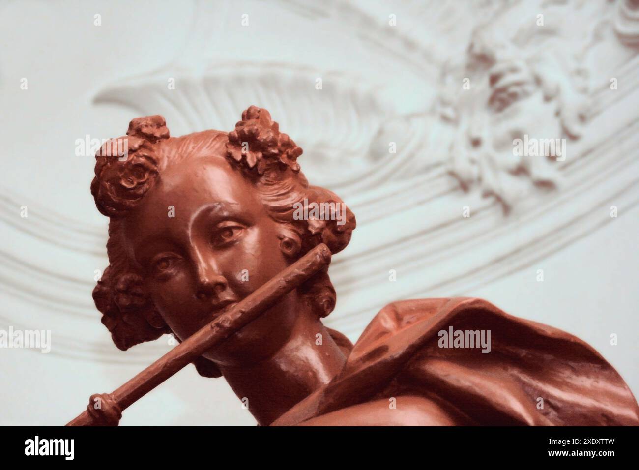 Angel playing flute hi-res stock photography and images - Alamy