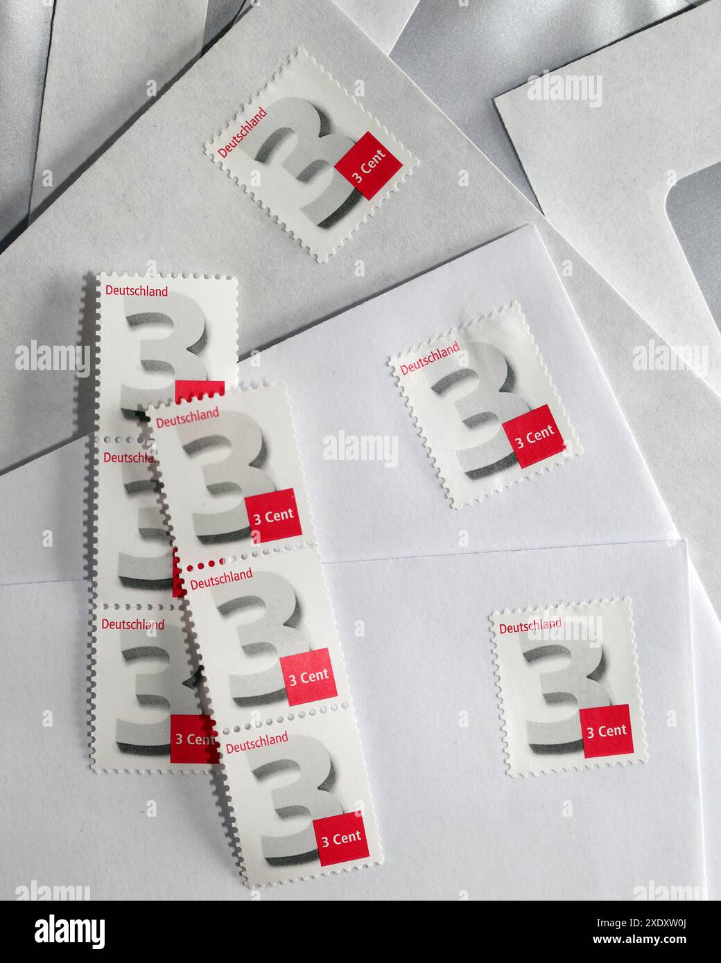 Three Cent Stamps with white Letter Stock Photo - Alamy