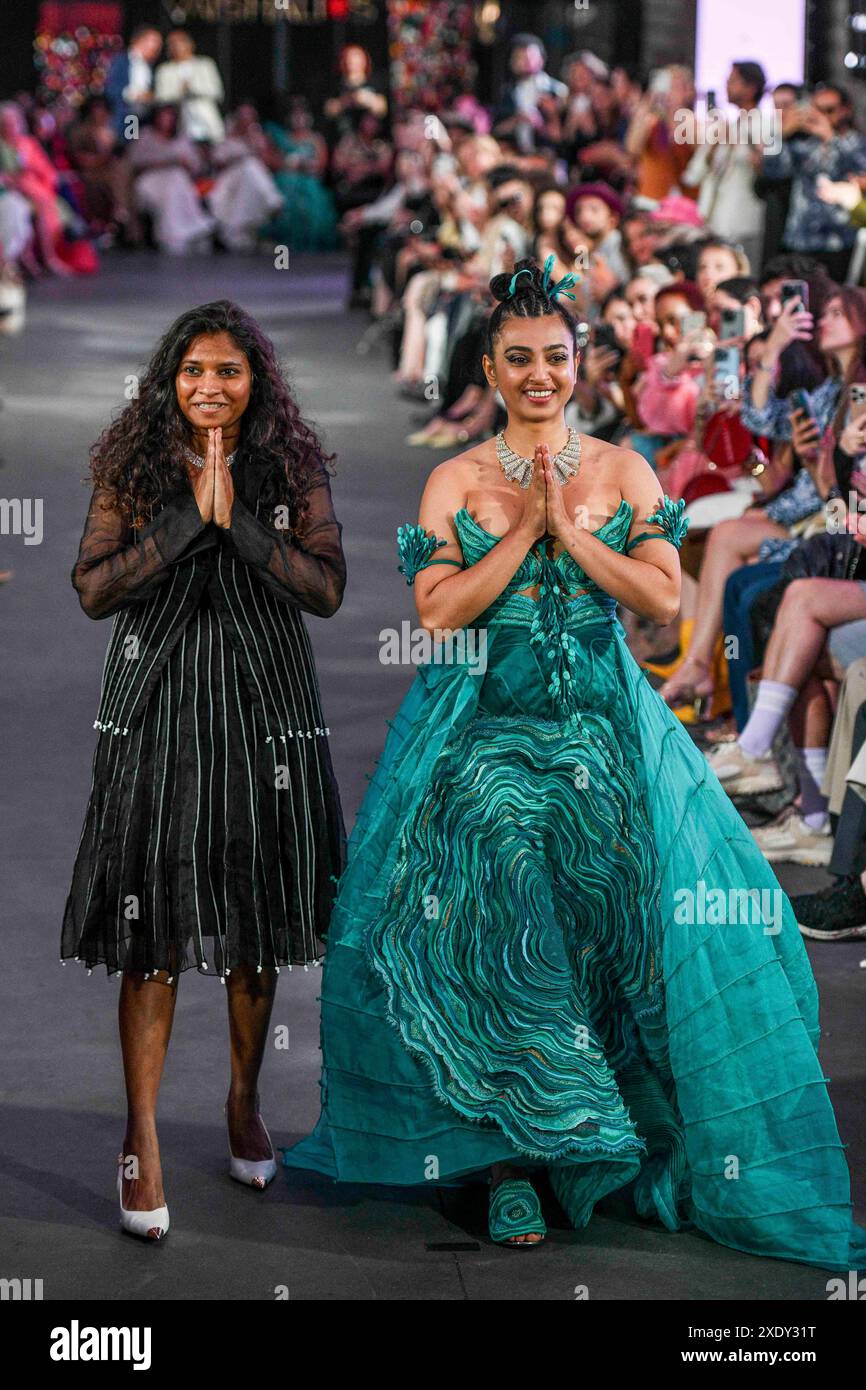 Designer Vaishali Shadangule acknowledges audience on the runway during ...