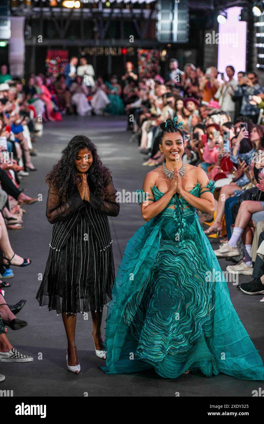 Designer Vaishali Shadangule acknowledges audience on the runway during ...
