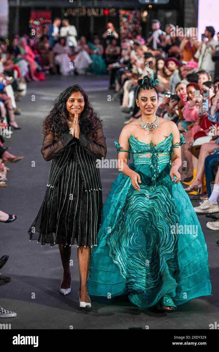 Designer Vaishali Shadangule acknowledges audience on the runway during ...