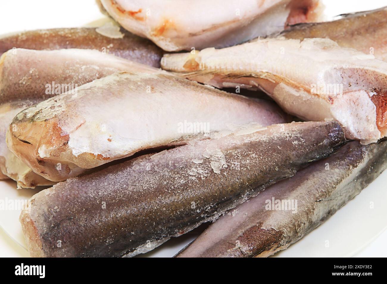 Frozen fish European hake Stock Photo - Alamy