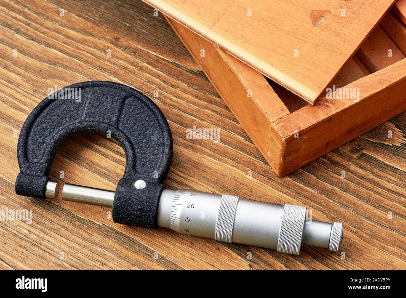 Micrometer at the wooden case Stock Photo - Alamy