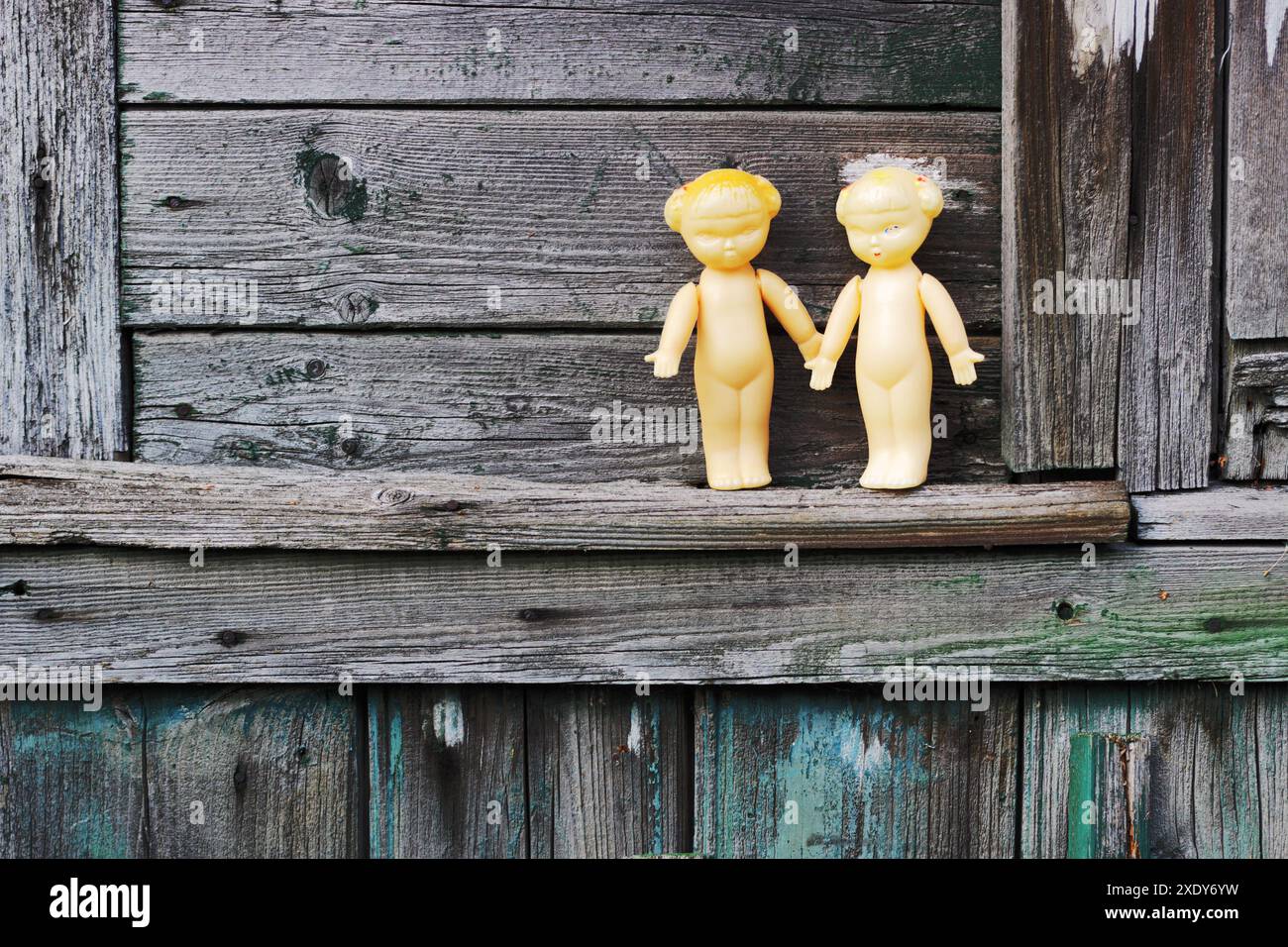 Vintage identical dolls Stock Photo - Alamy