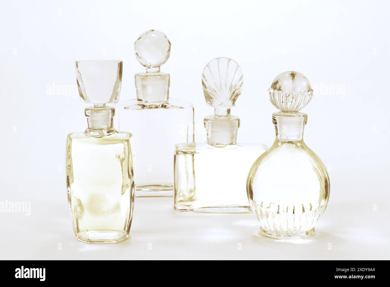 Vintage bottles of perfumes as background Stock Photo - Alamy