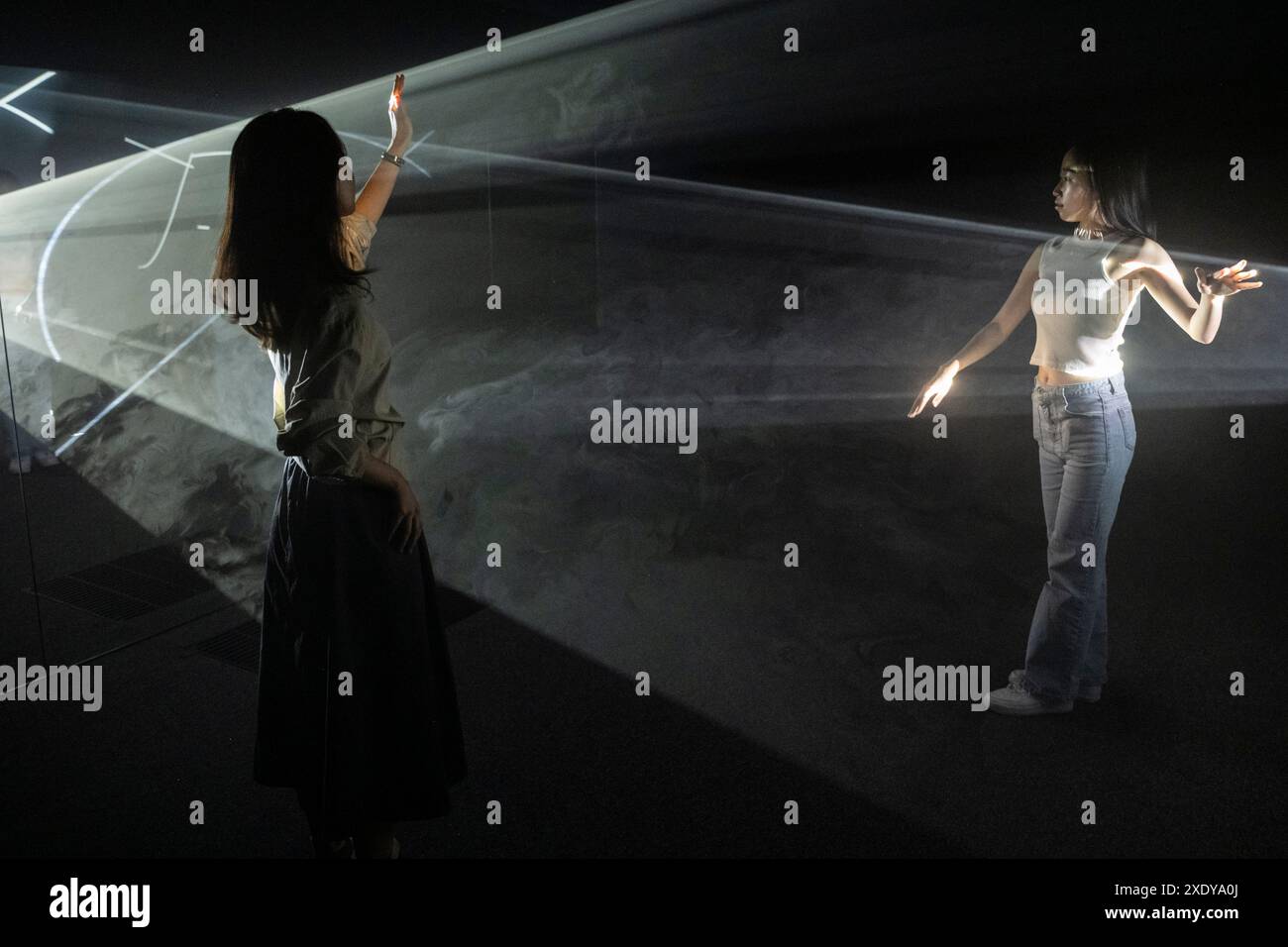 London, UK. 25 June 2024. Visitors experience an immersive artwork at ...